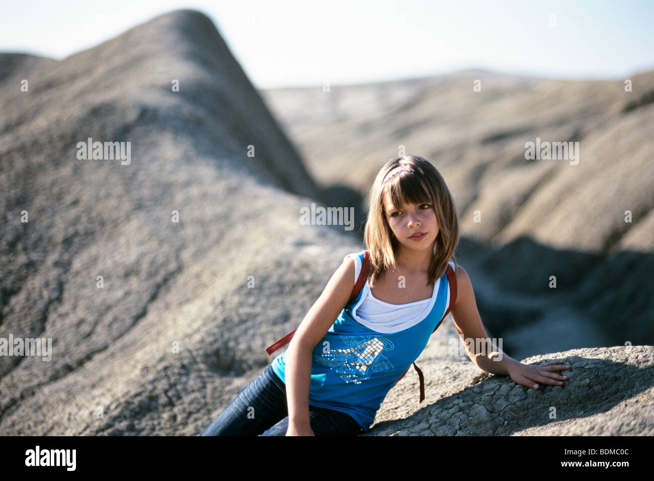 beautiful girl standing on volcanoes and admiring beauty of nature ...
