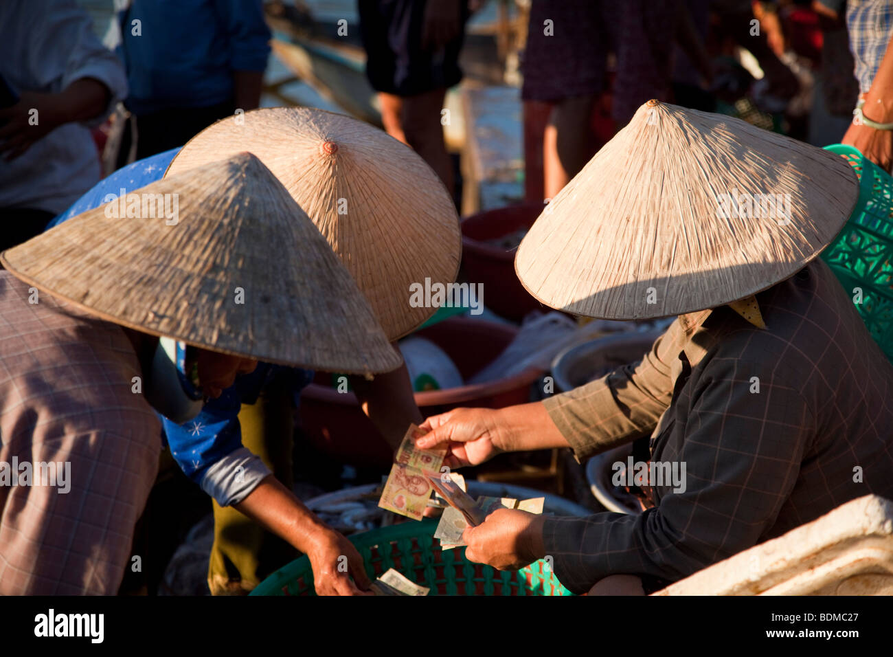 Vietnamese woman selling fish hi-res stock photography and images - Alamy
