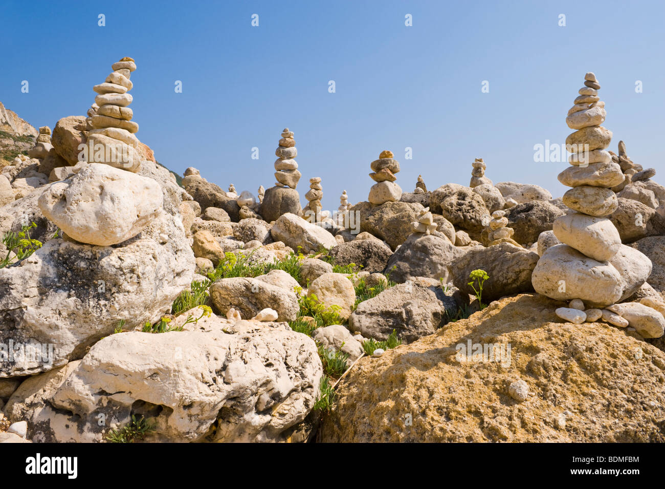 Rocks and pebbles stacked and made into interesting formations at ...