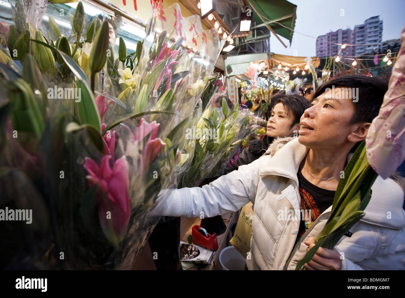 Lady selling flowers market in hi-res stock photography and images - Alamy