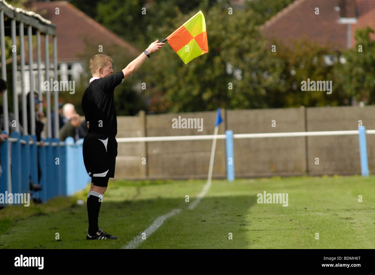 linesman indicating an offence Stock Photo - Alamy