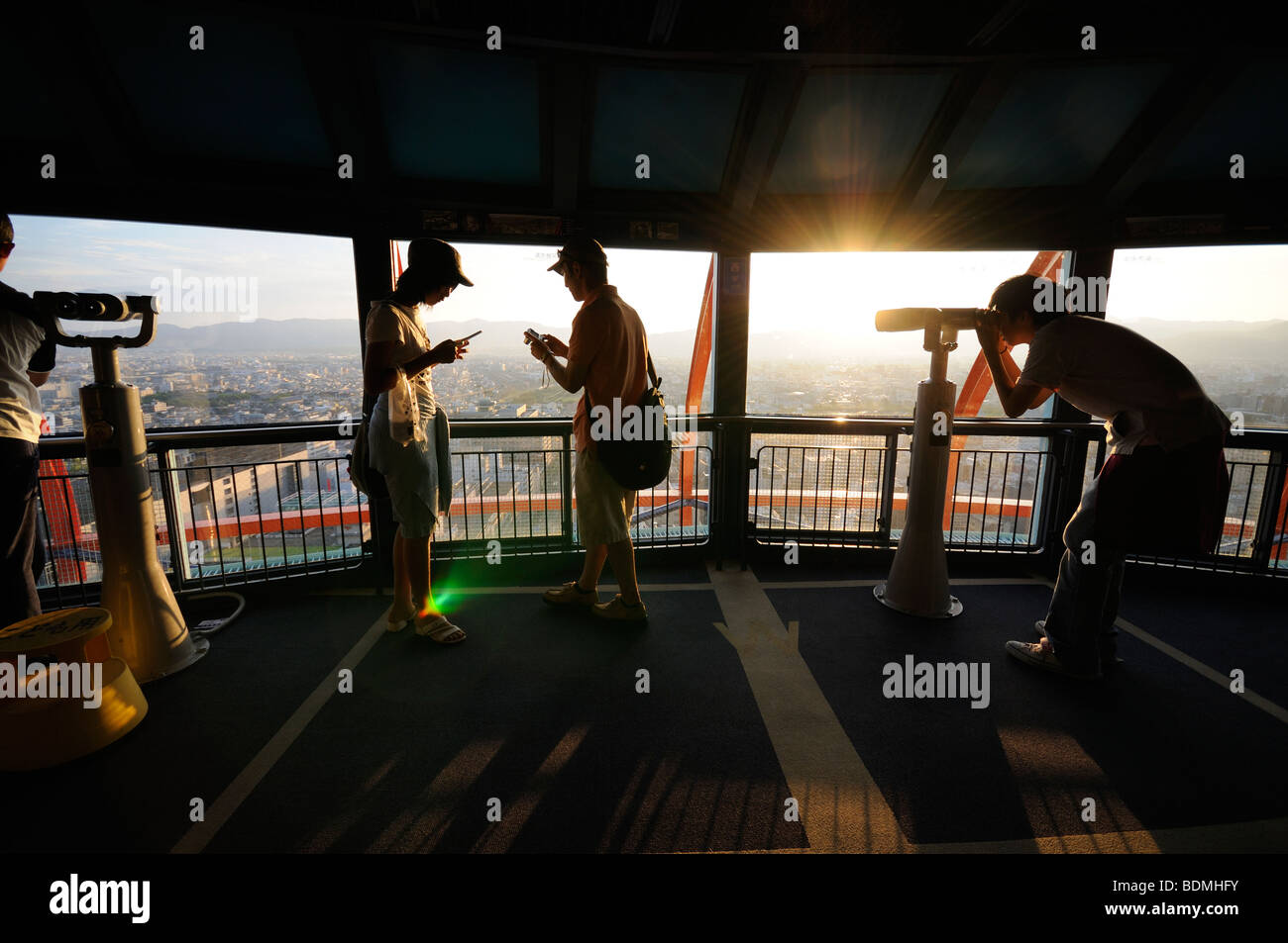 Visitors and sunset lights. Observation deck of Kyoto Tower. Kyoto ...