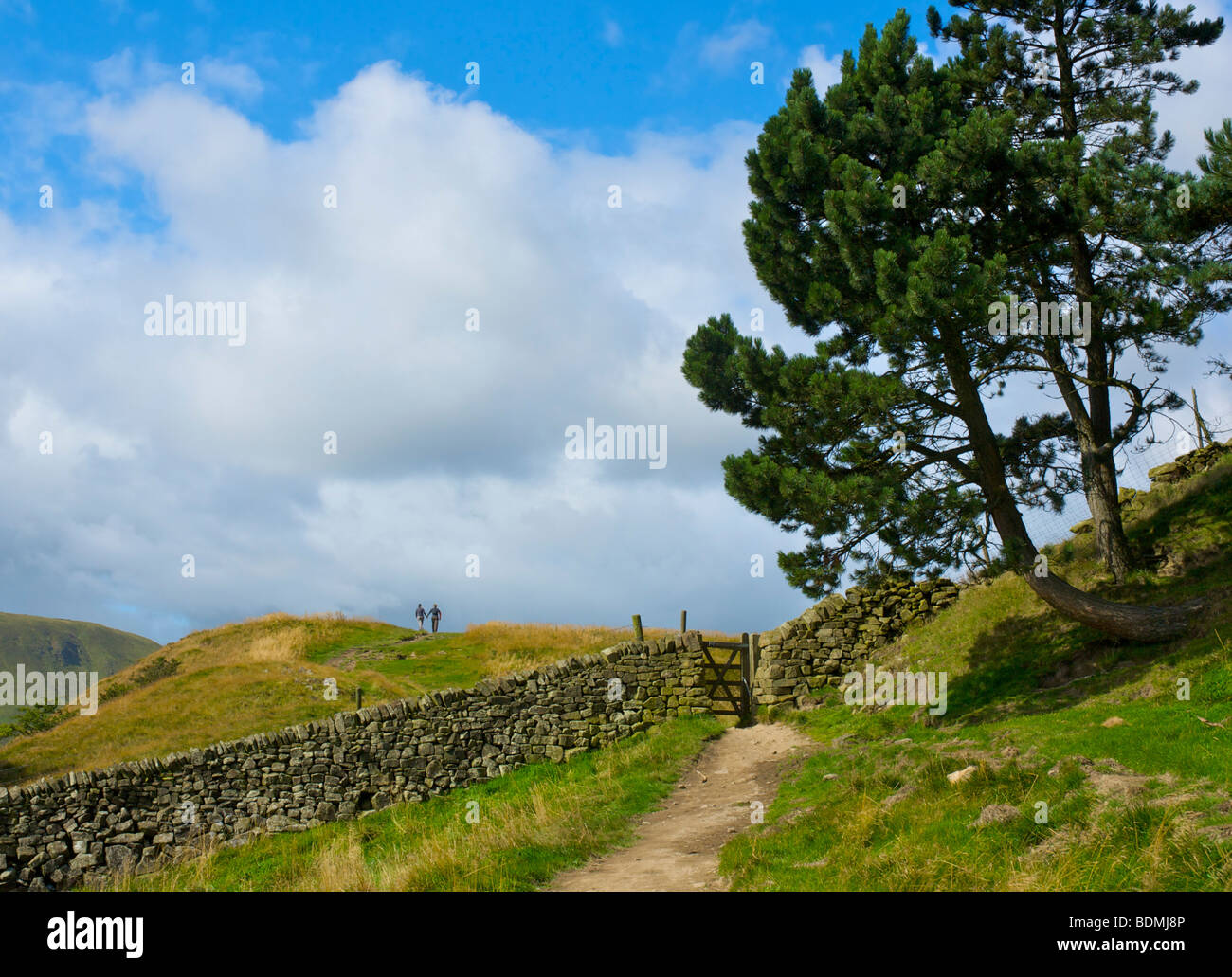 Two walkers on the Pennine Way near Upper Booth, Edale valley, Peak ...