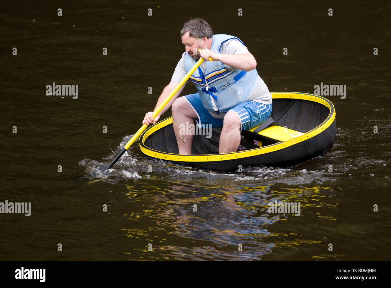 Man in Coracle in Shropshire, England Stock Photo - Alamy