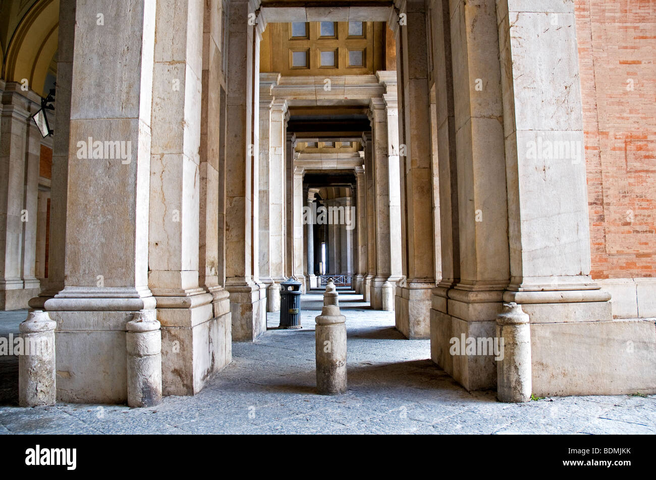 Stone pillars support the arched ceilings in the entrance passageways ...