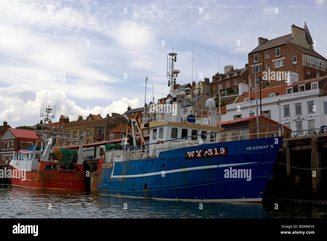 Fishing boats in Whitby Harbour Stock Photo - Alamy