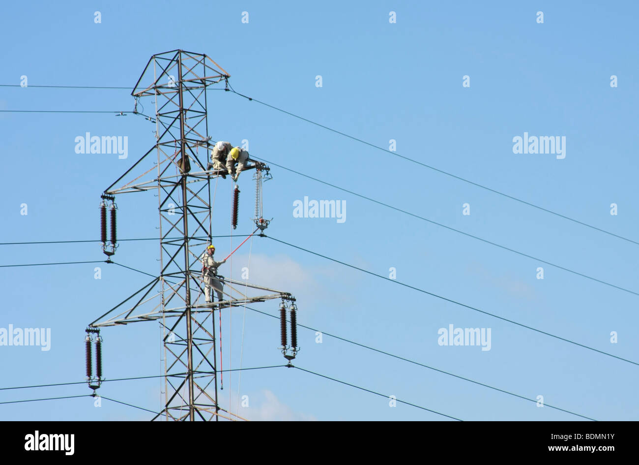 High tension workers hi-res stock photography and images - Alamy