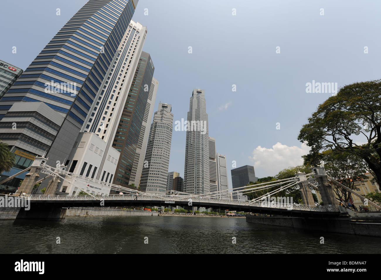 view down Singapore River to Cavanagh bridge and financial district ...