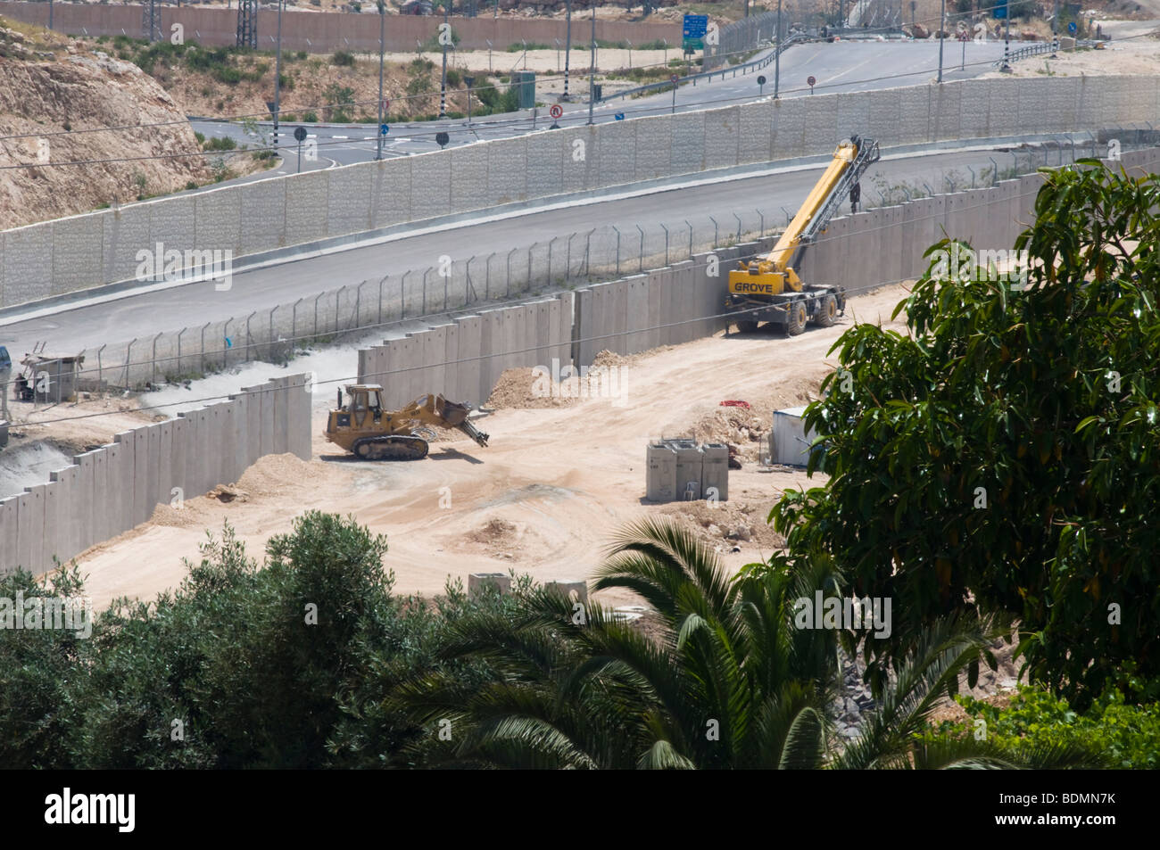 Construction continues on the separation wall built by Israel on land ...