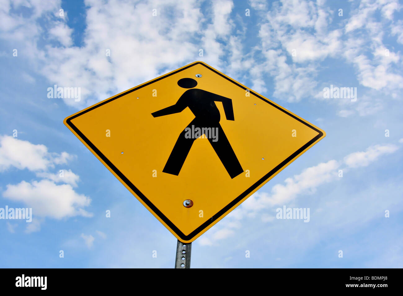 Man on sign, walking on the sky and clouds Stock Photo - Alamy