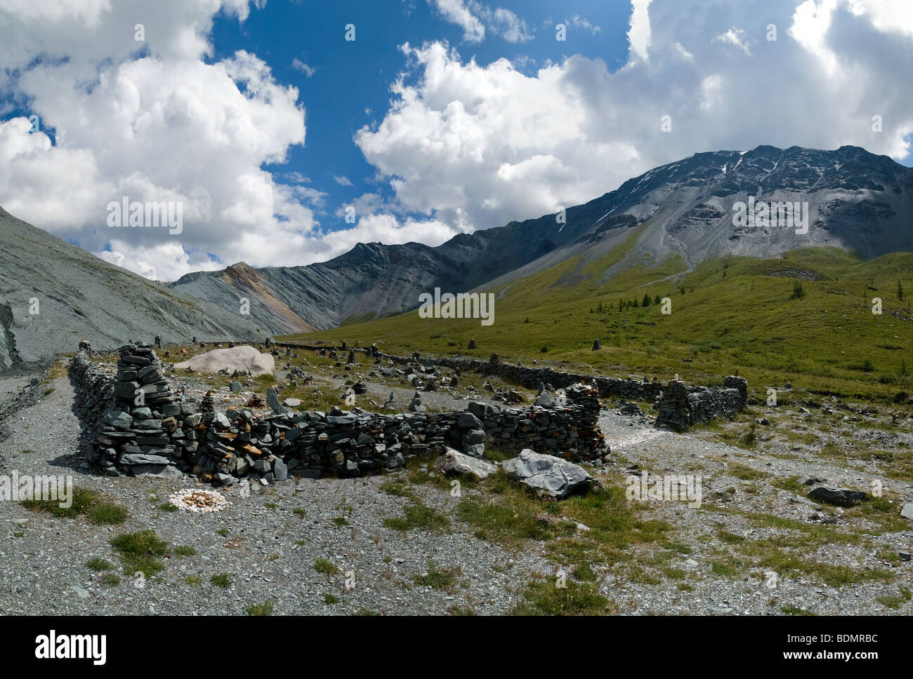 "Shaman stone" surrounded by stone fence in the valley of Yarlu river ...