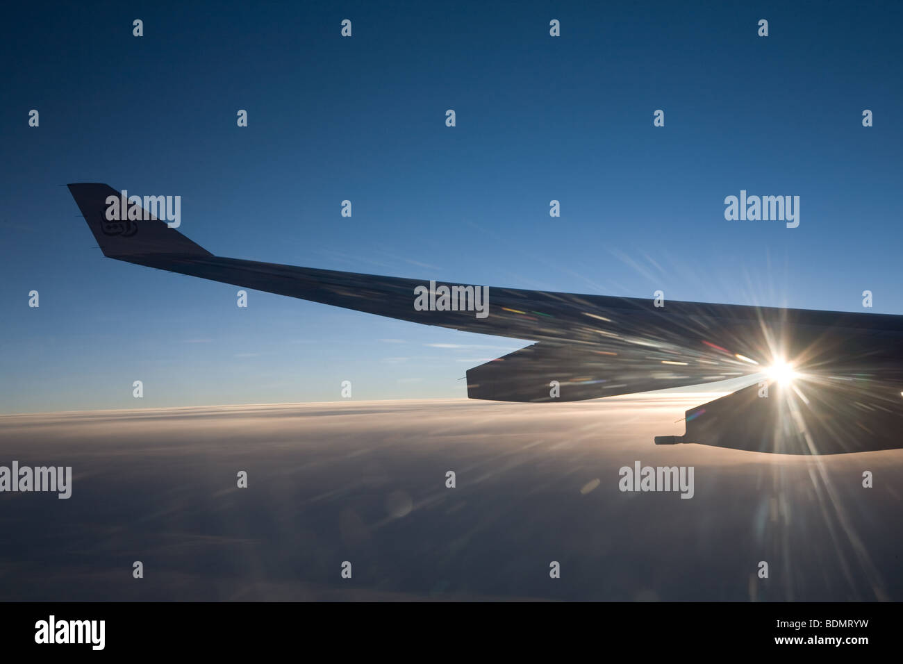 airplane wing at night dusk sunburst sunset plane Stock Photo - Alamy