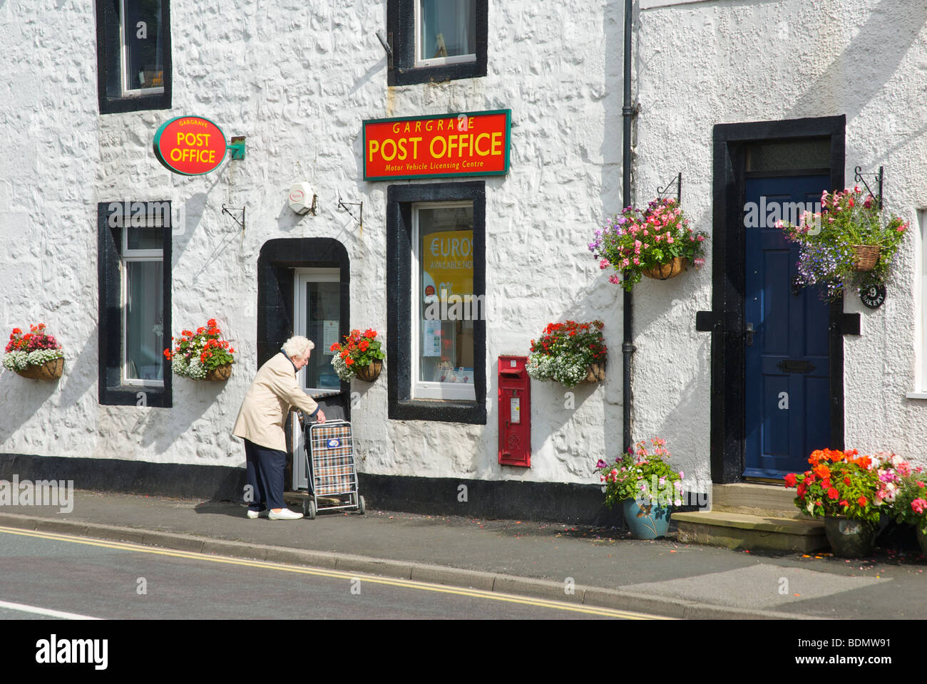 Royal mail post trolley hi-res stock photography and images - Alamy