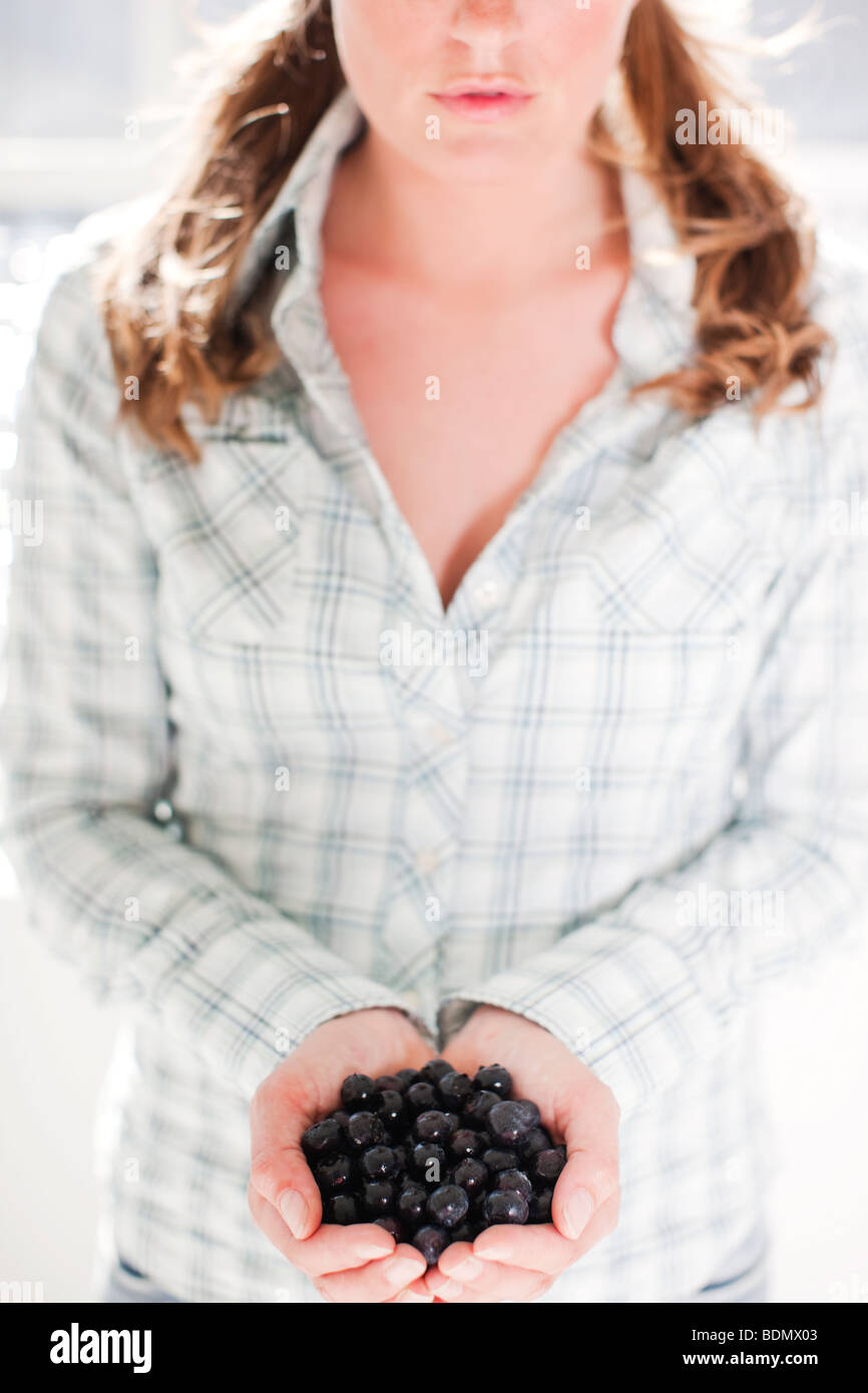 Handful of Blueberries Stock Photo - Alamy
