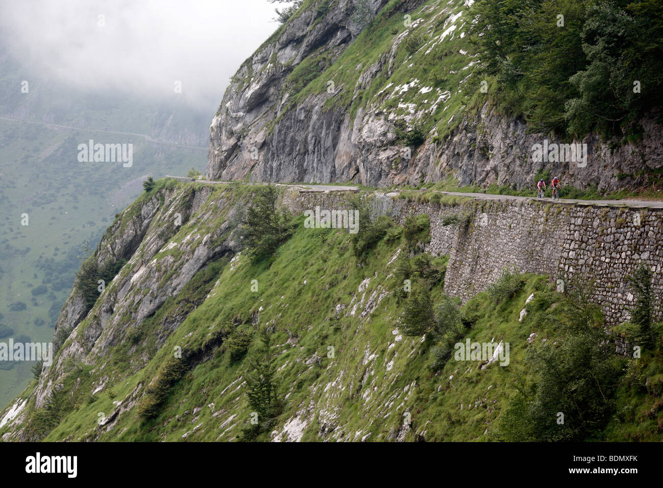 A mountainside road in the Vallee D'Ossau in the Haute Pyrenees in ...