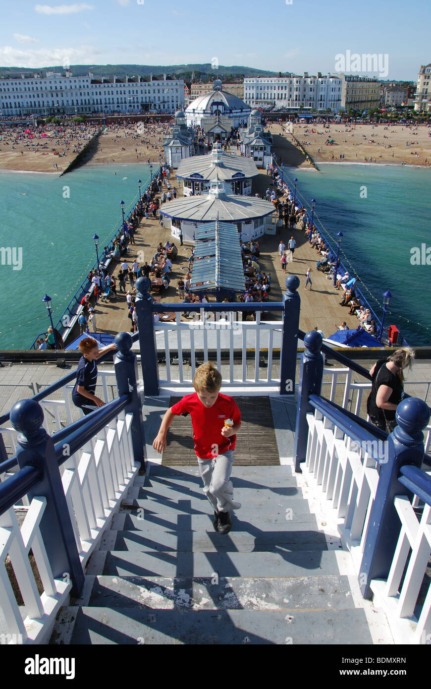 Boy running up stairs hi-res stock photography and images - Alamy
