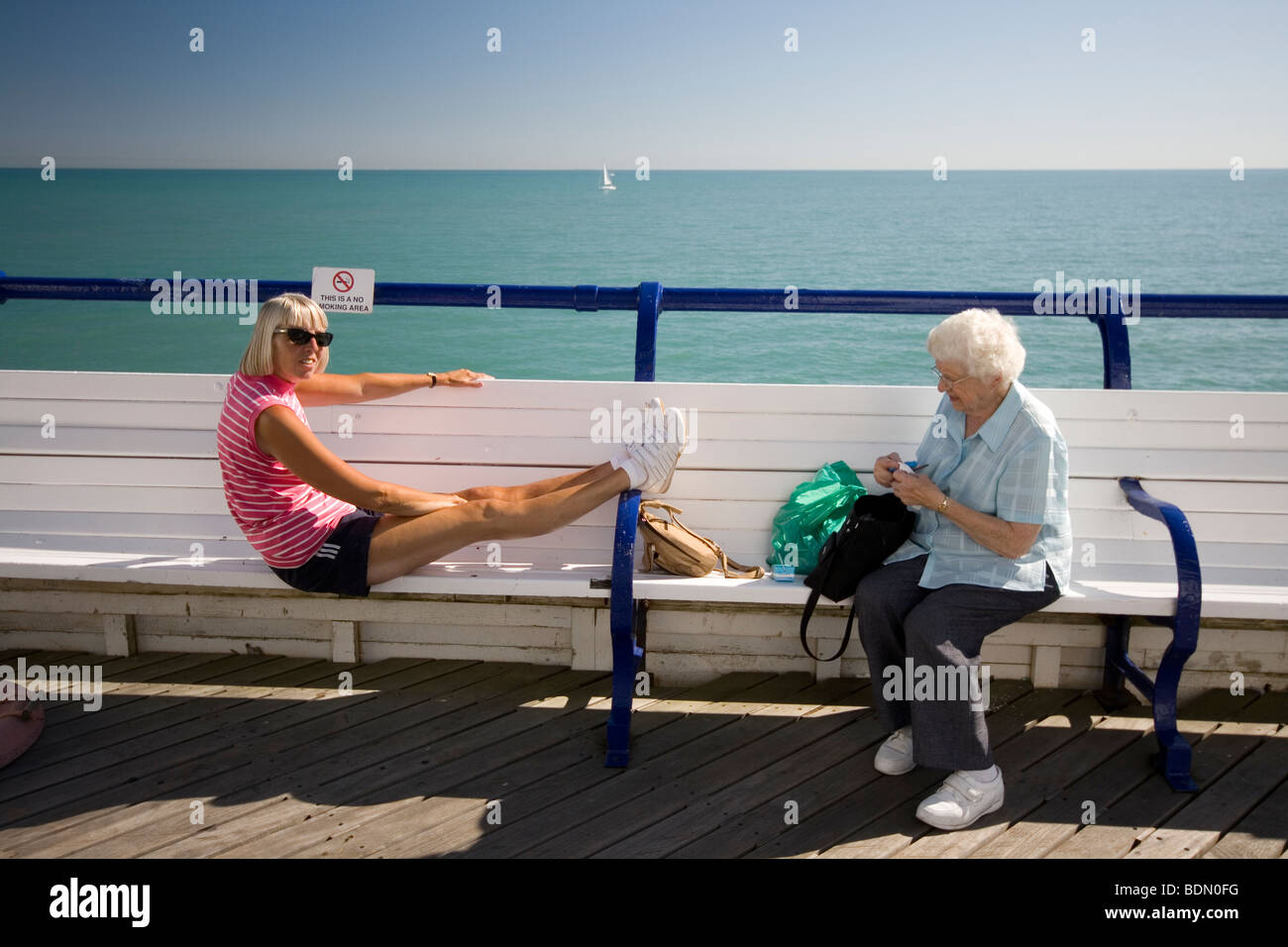 People sit on bank hi-res stock photography and images - Alamy