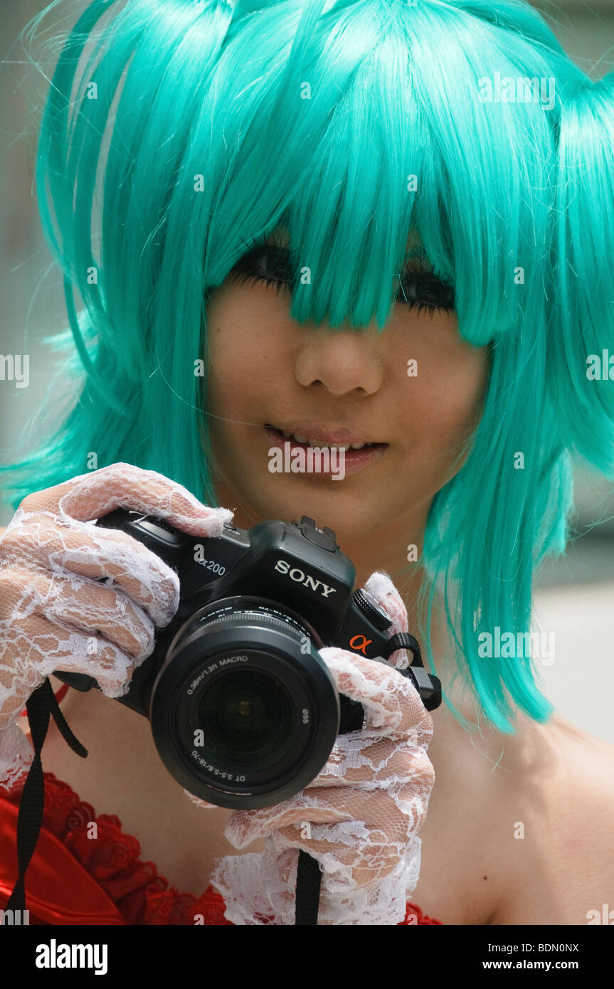 model with a camera at Japanese Cosplay festival in Bangkok Thailand ...