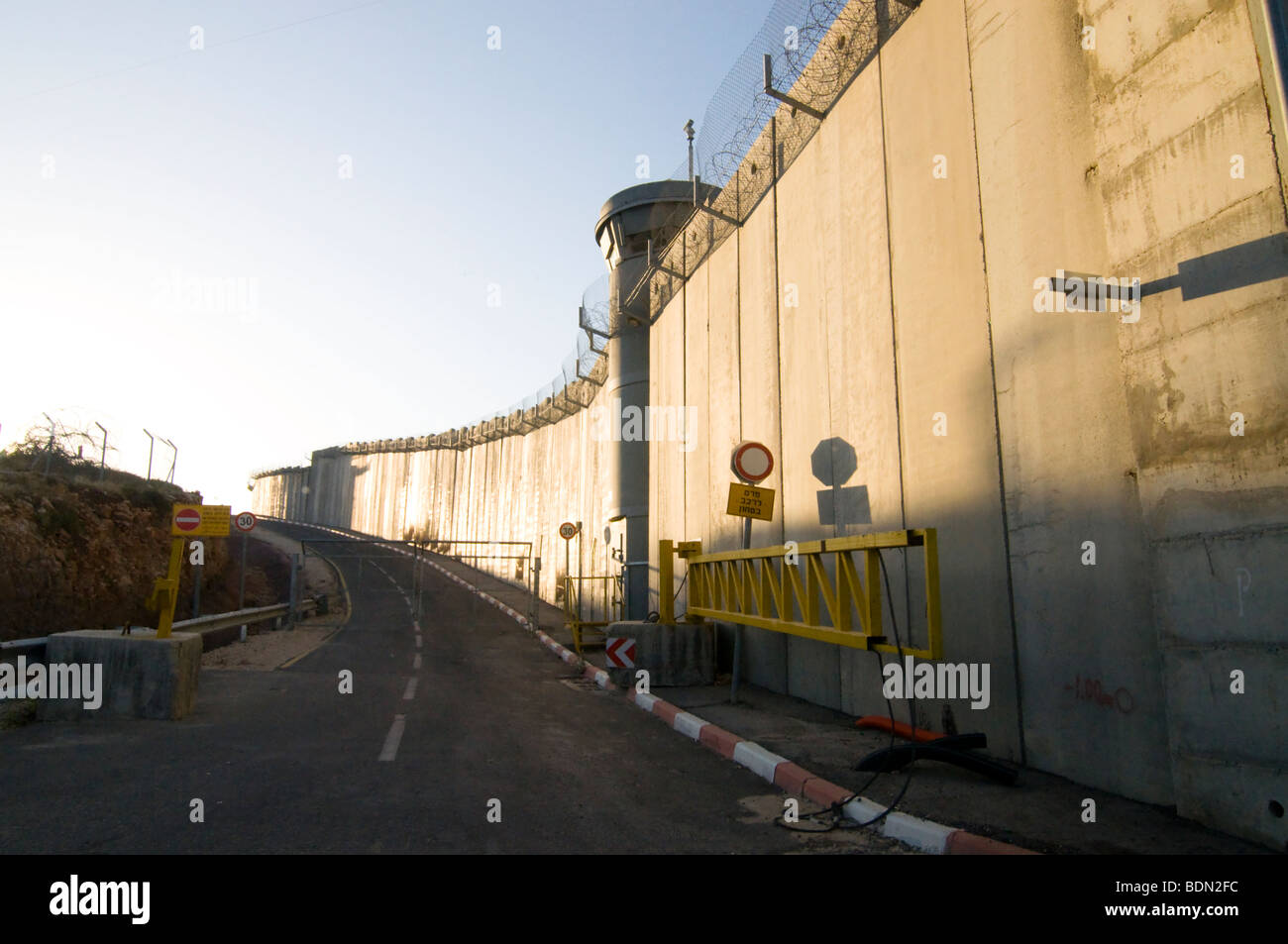 The Israeli separation wall divides Palestinian lands in the West Bank ...