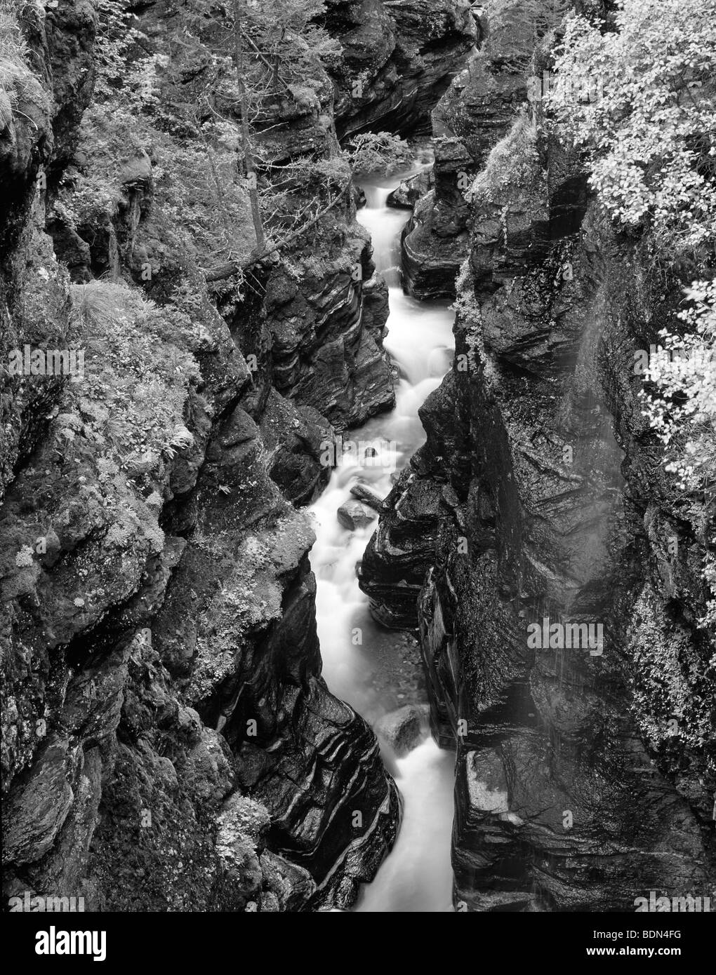 Narrow section of Red Rock Canyon. Waterton National Park, Canada Stock ...