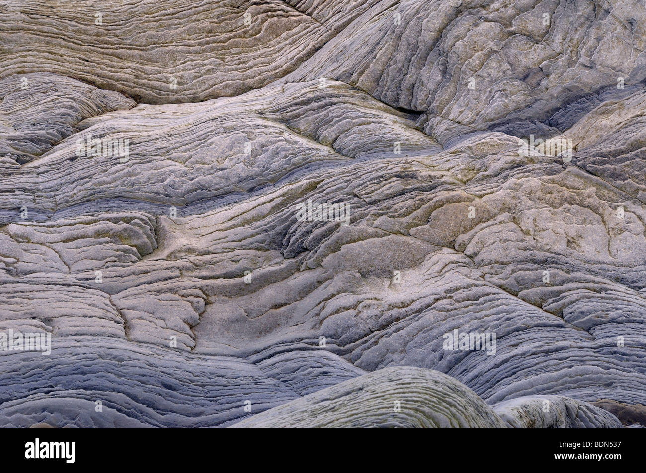 Abstract wave pattern of smoothed sedimentary layers of rock and stone ...