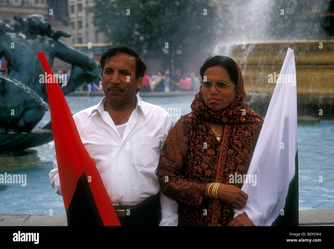 Pakistani-English man, Pakistani-English woman, protesters, political ...