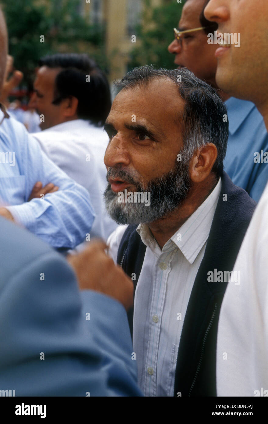 Pakistani people men getting together at political rally in Trafalgar ...