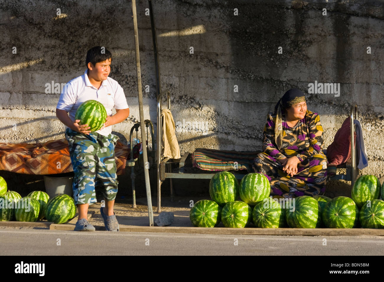 Woman selling watermelons market hi-res stock photography and images ...
