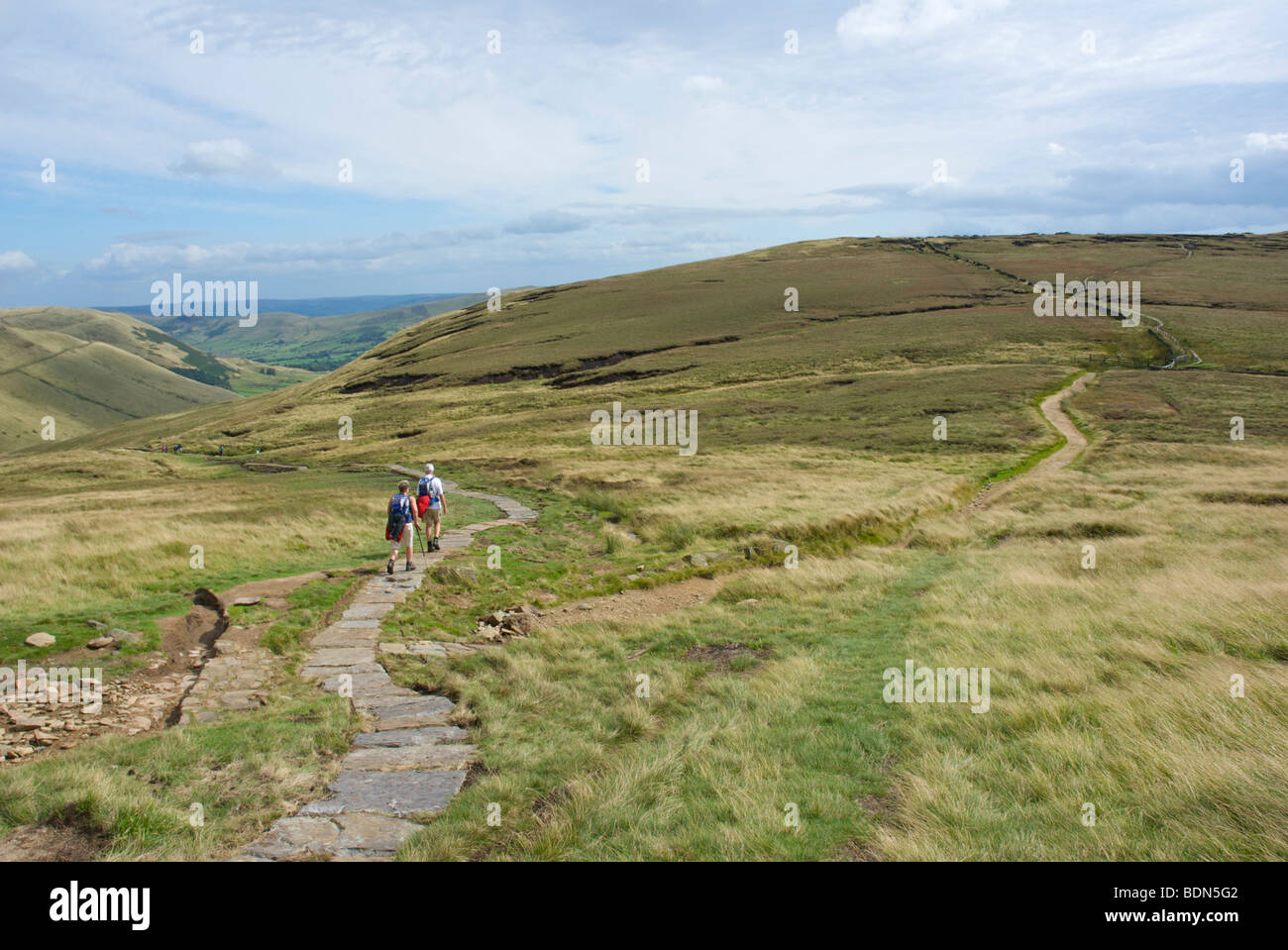 Walkers on repaired section of Pennine Way path on Kinder Scout, near ...