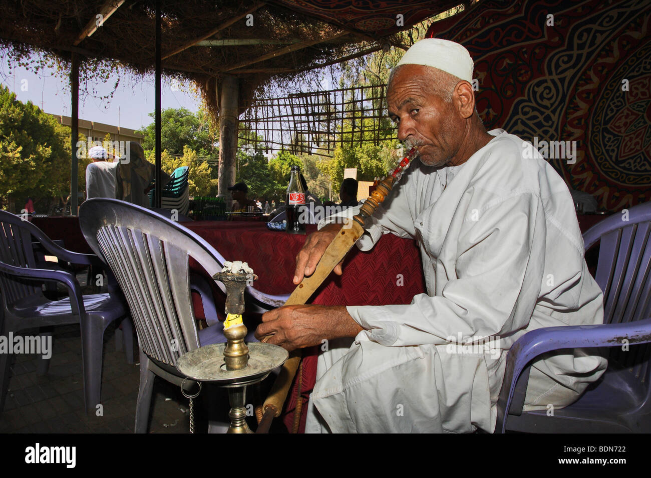 Shisha, man smoking a hookah, Bahariya Oasis, Egyptian Sahara, Egypt ...