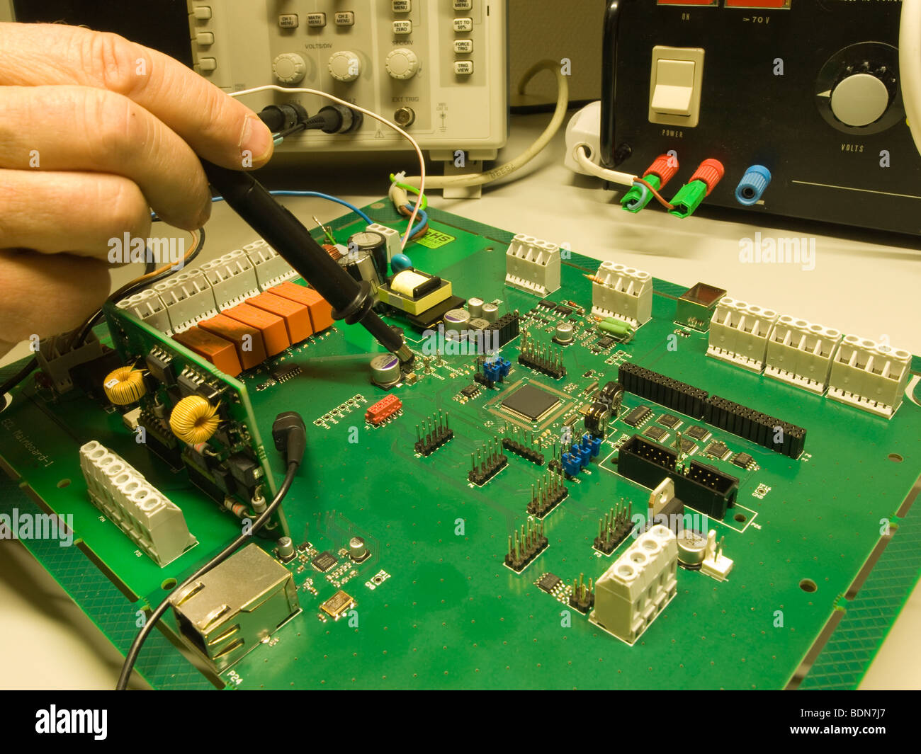 Electronics technology capacitor measure hi-res stock photography and ...