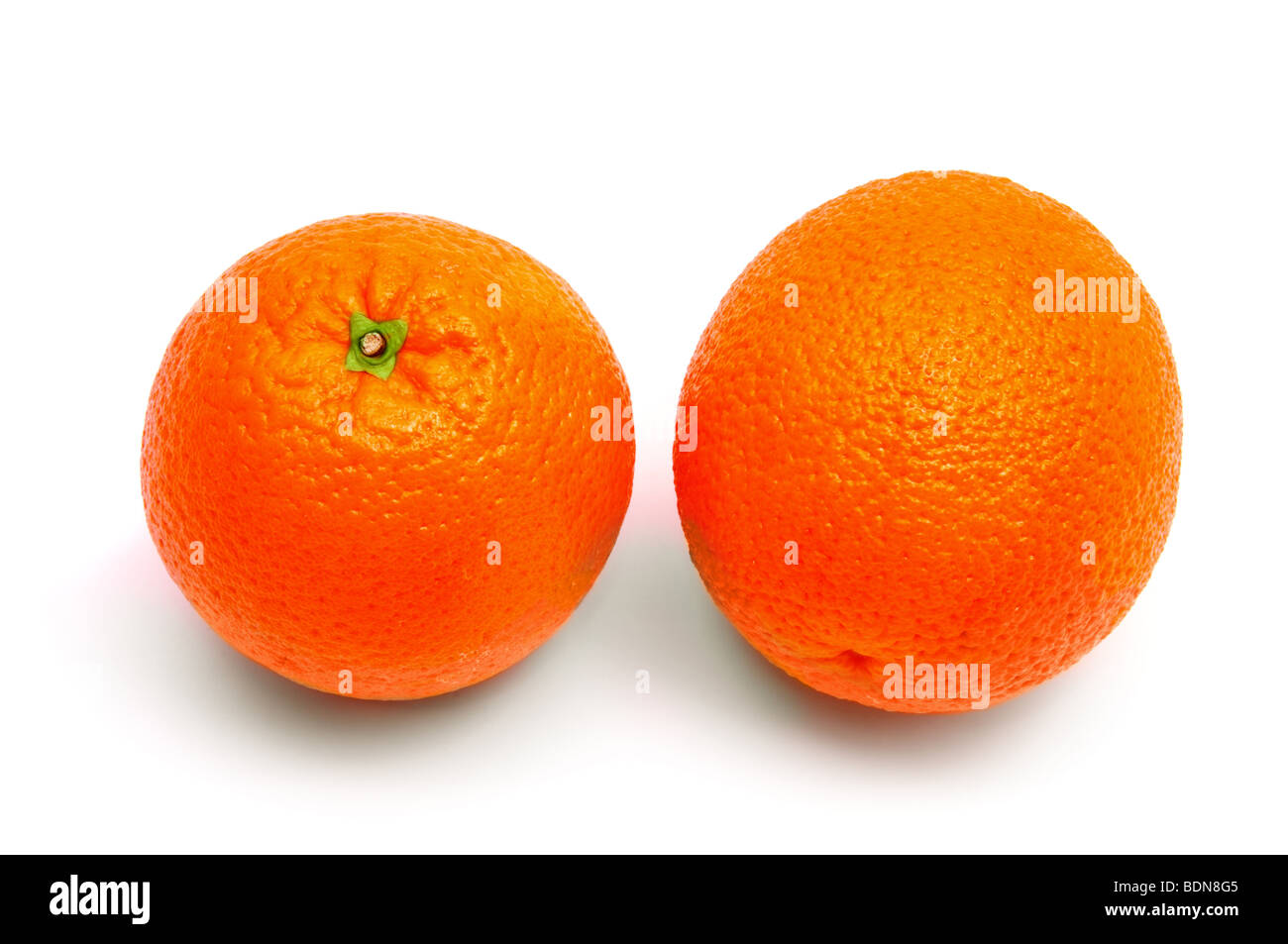 Two mandarin oranges Cut Out Stock Images & Pictures - Alamy