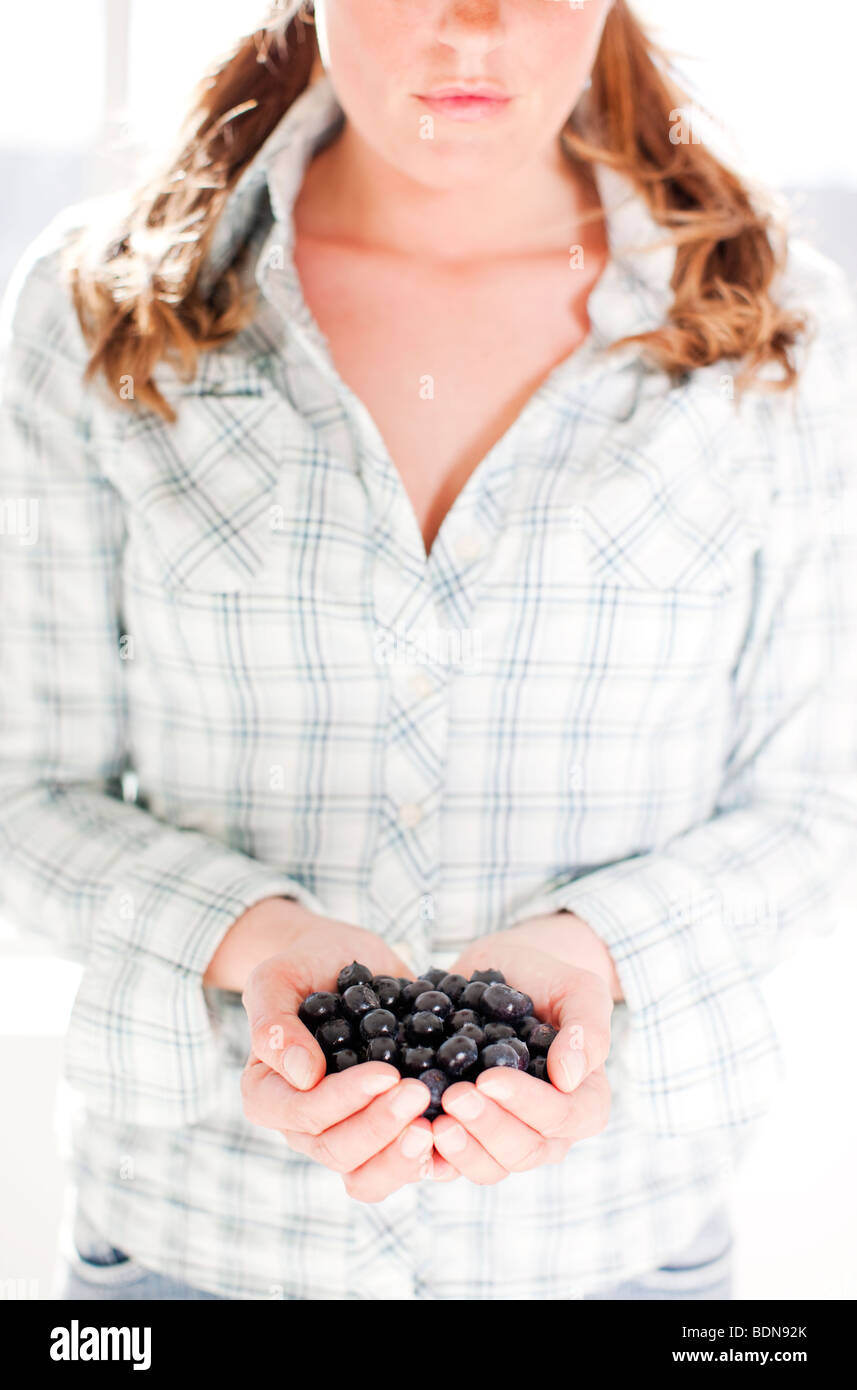 Handful of Blueberries Stock Photo - Alamy