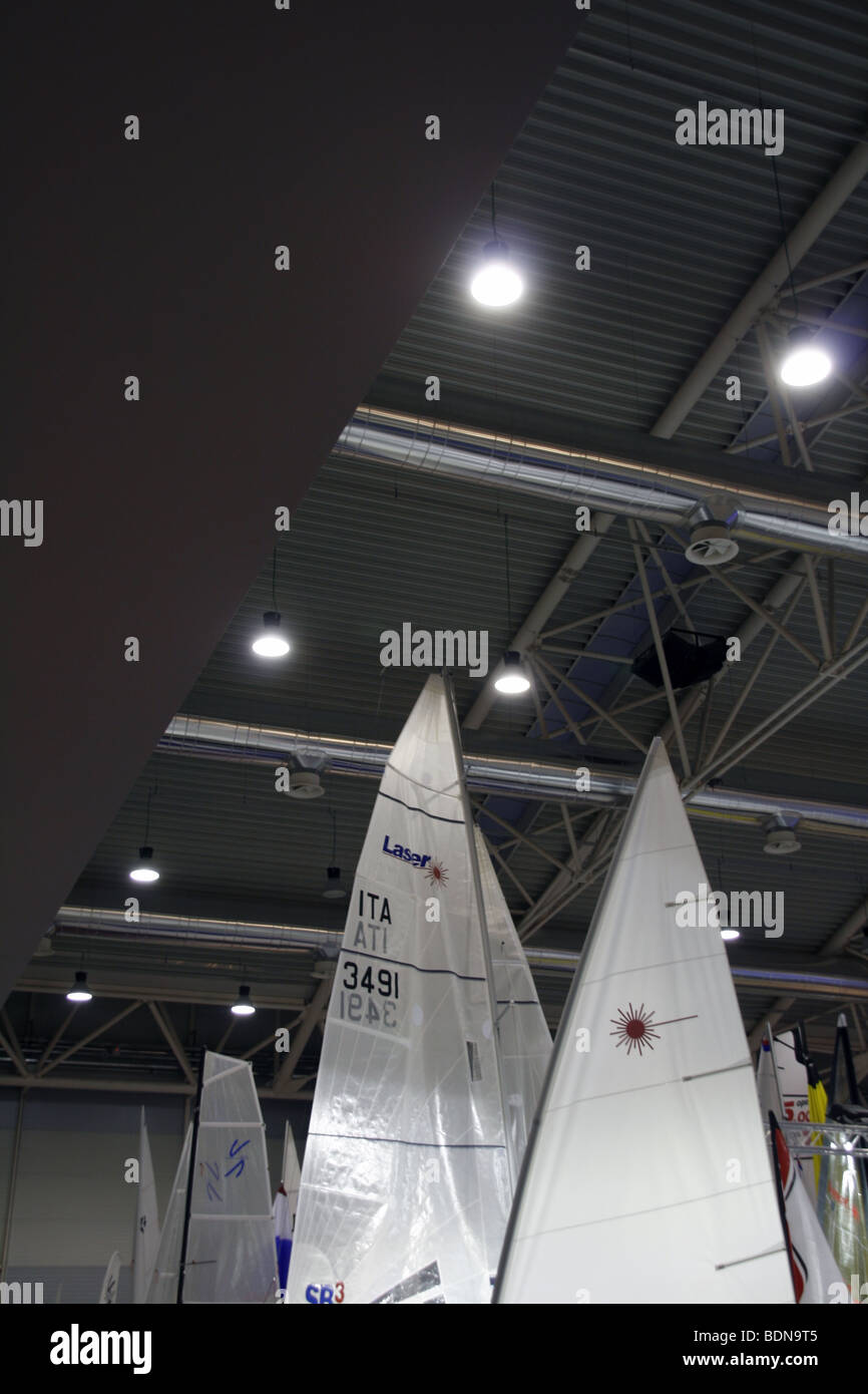 sailing yachts at boat show in exhibition hall Stock Photo - Alamy