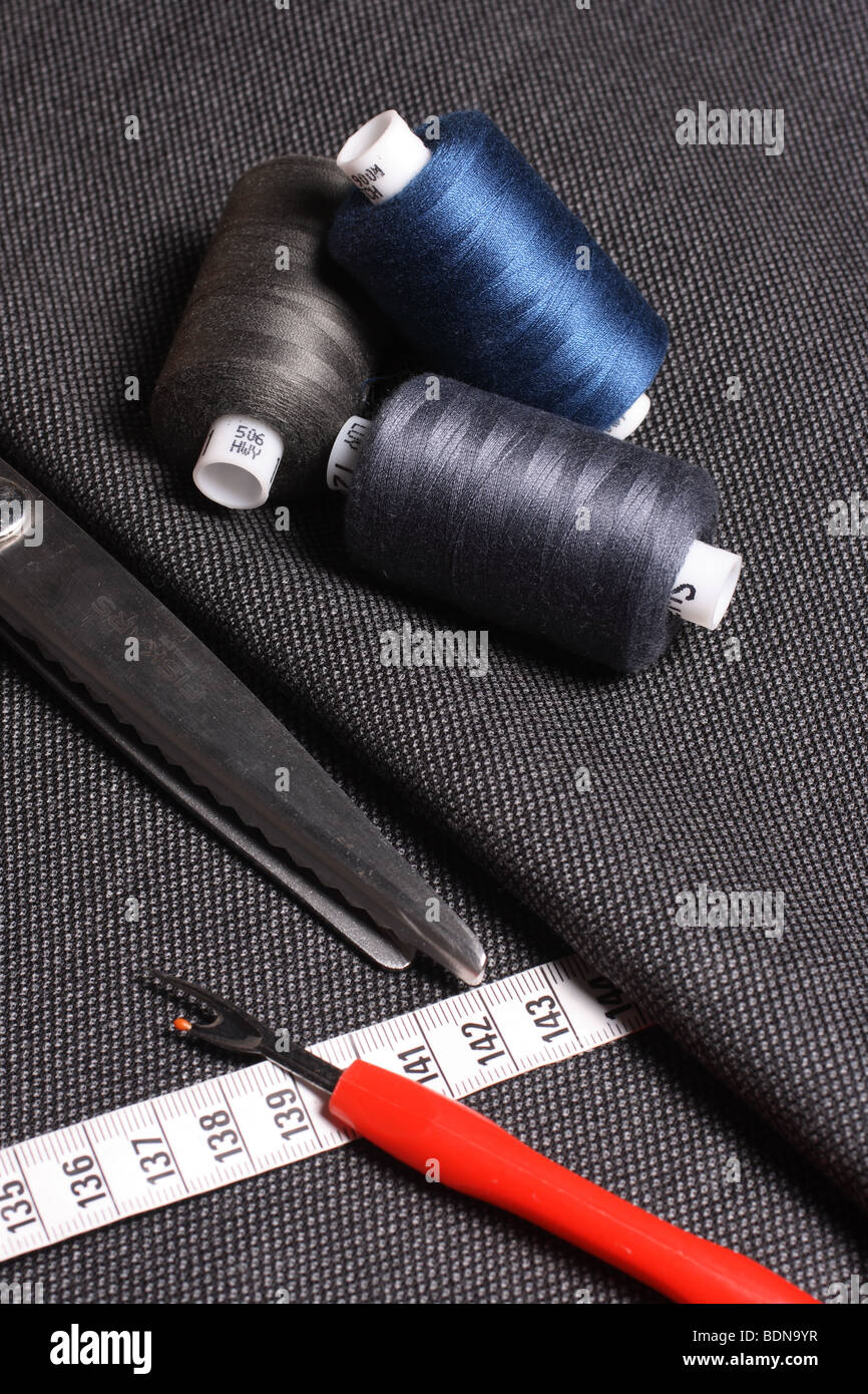 Tailor scissors tape measure suit hi-res stock photography and images ...