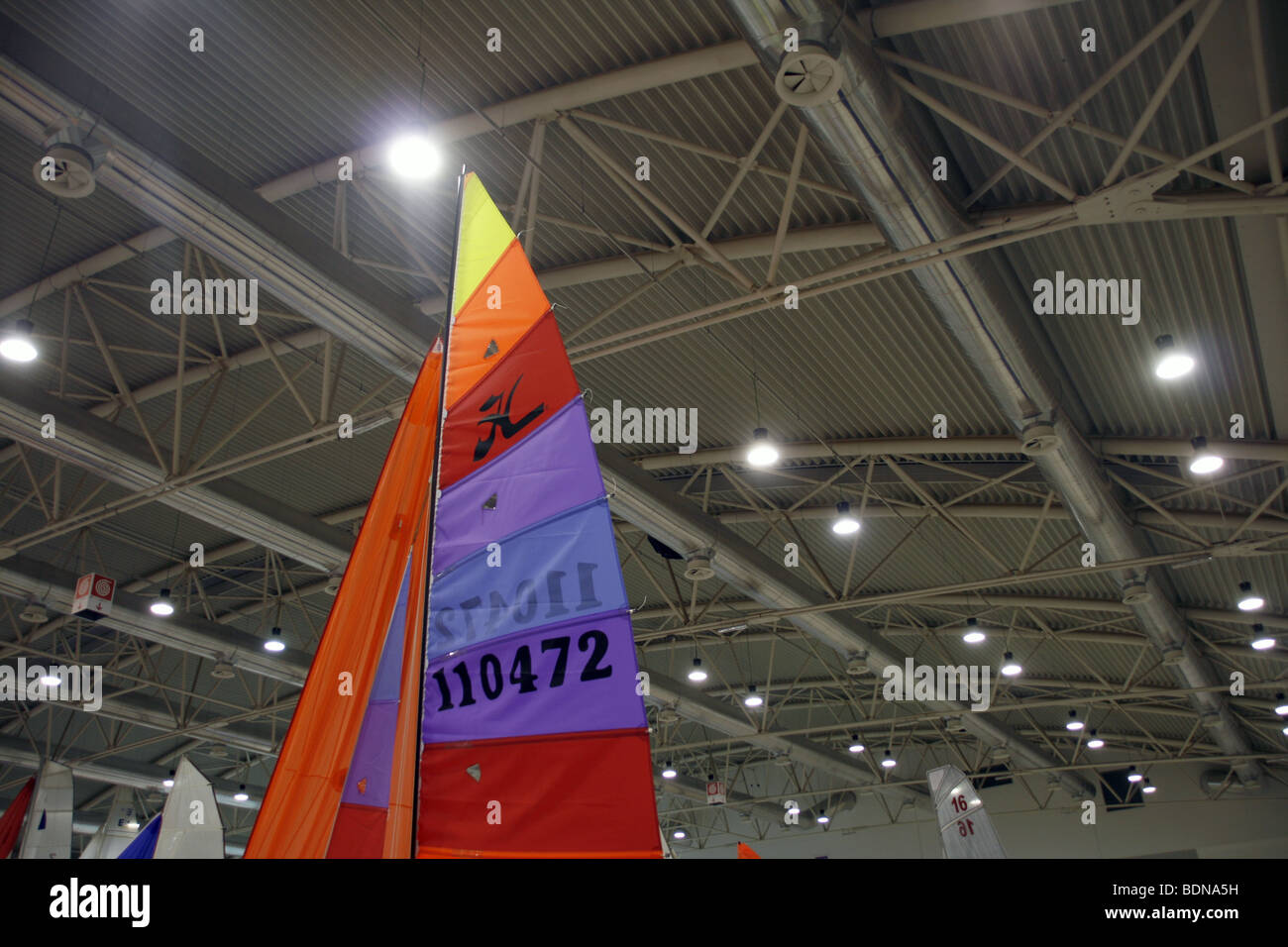 sailing yachts at boat show in exhibition hall Stock Photo - Alamy