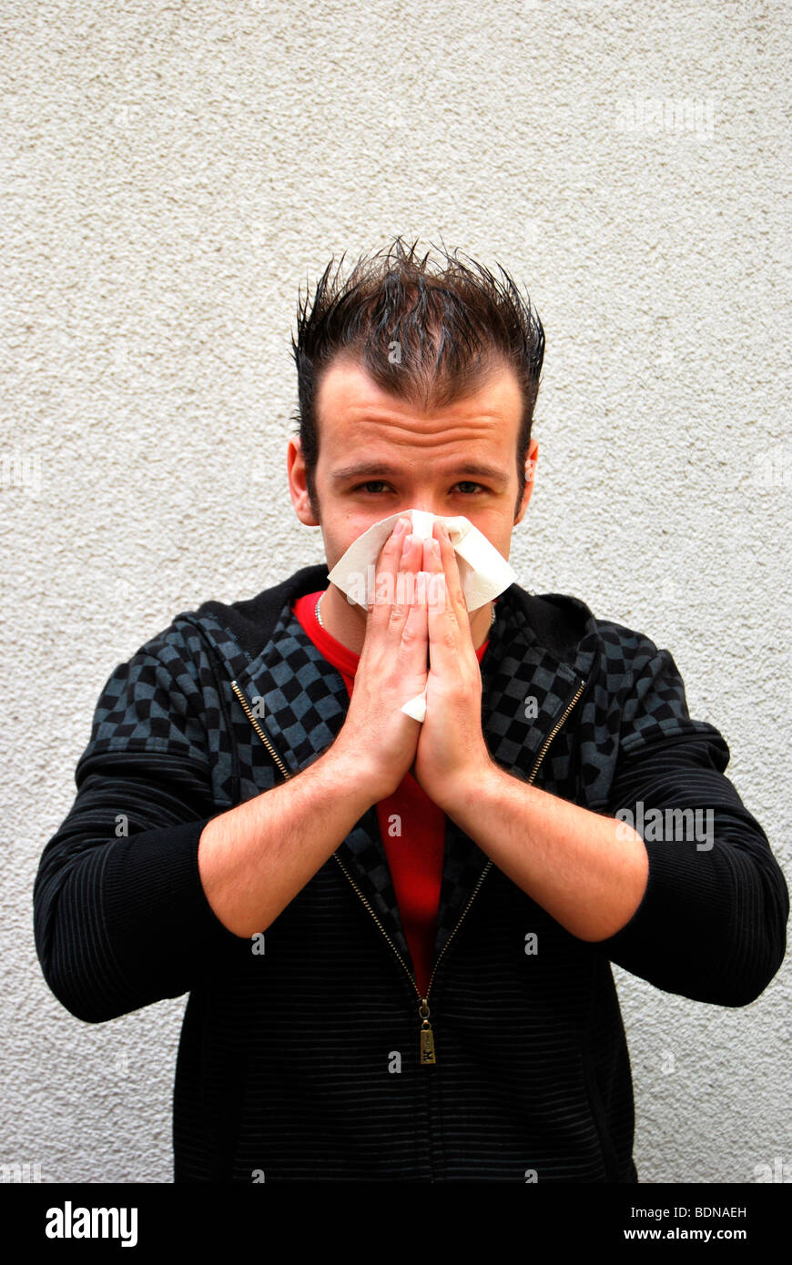 Young man with cold Stock Photo - Alamy