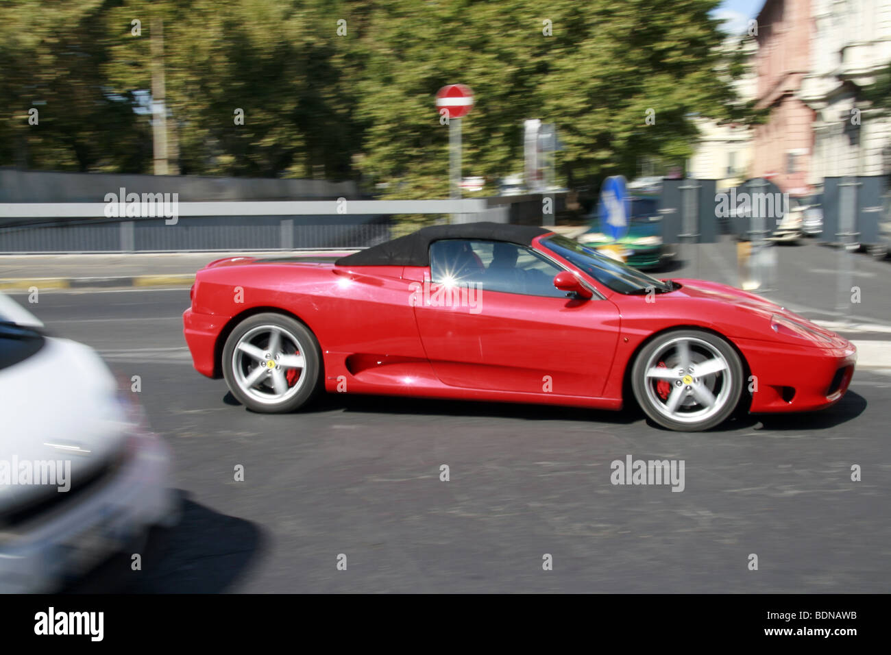 Red ferrari sports car in street in rome hi-res stock photography and ...