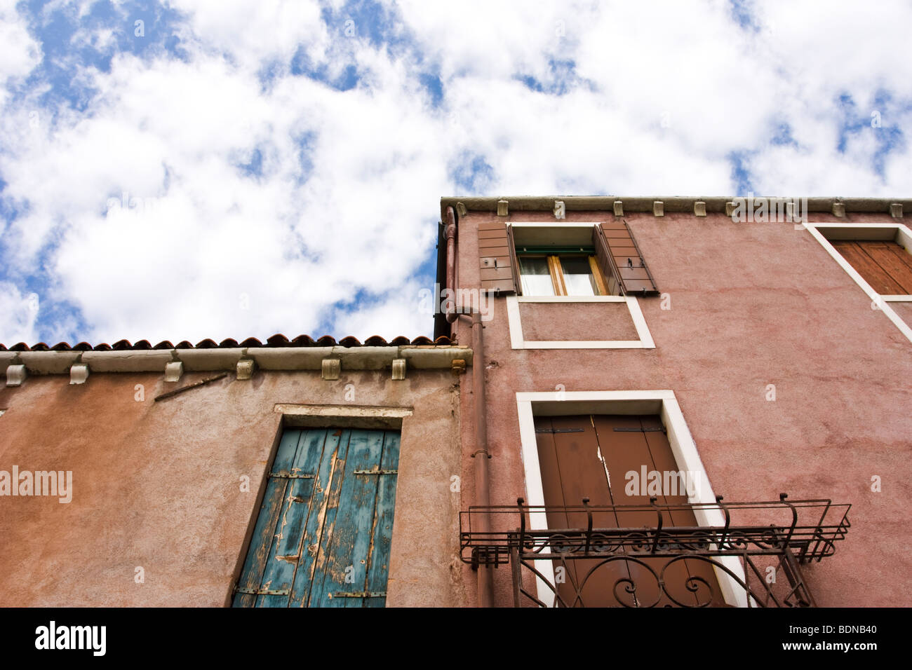 Red houses in Venice Stock Photo - Alamy