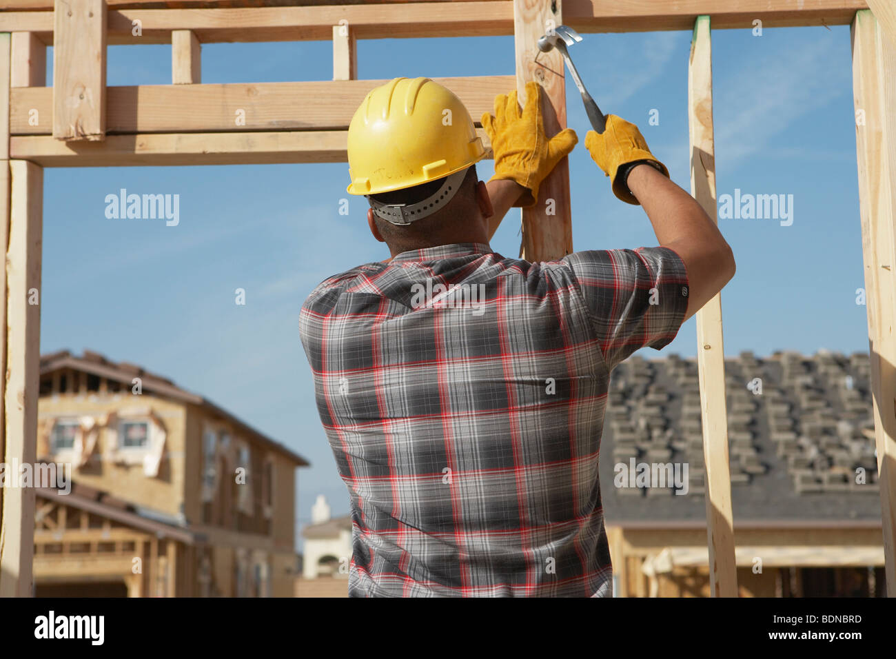 Construction Worker Working on Timber Frame Stock Photo - Alamy