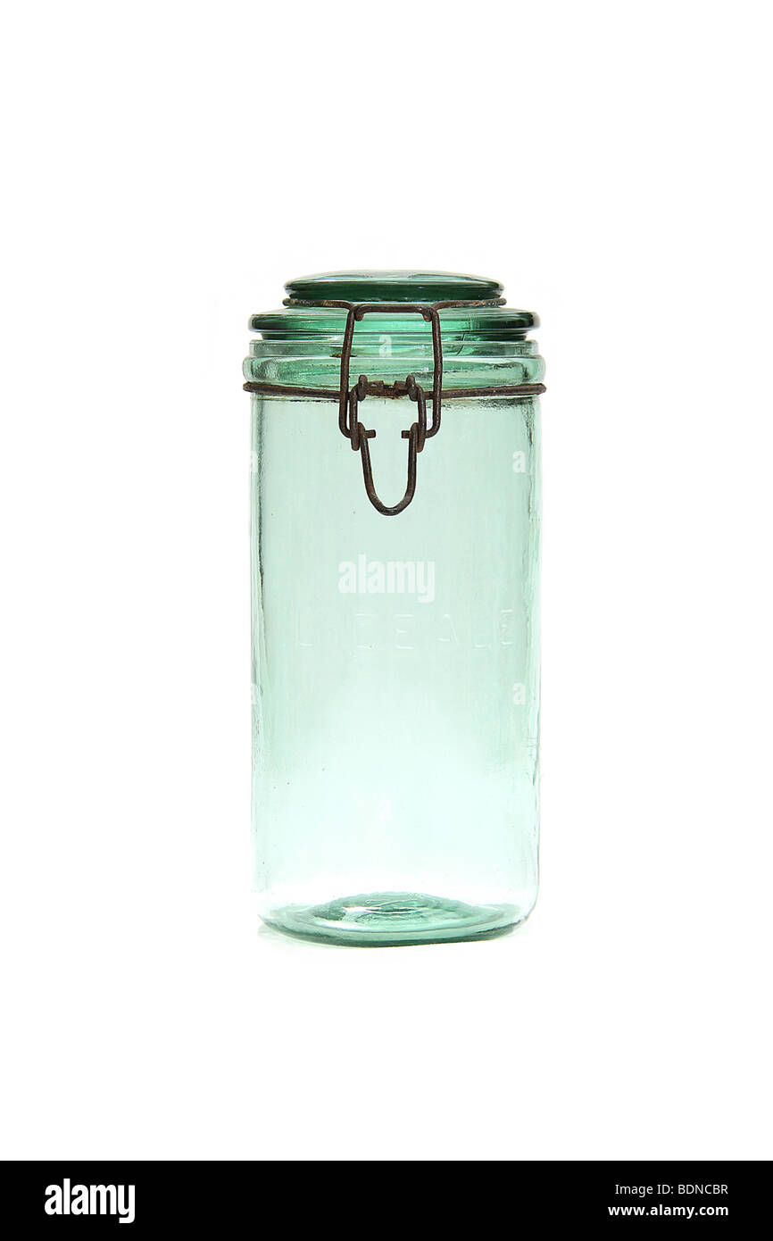 empty green jar closed on isolated background Stock Photo - Alamy