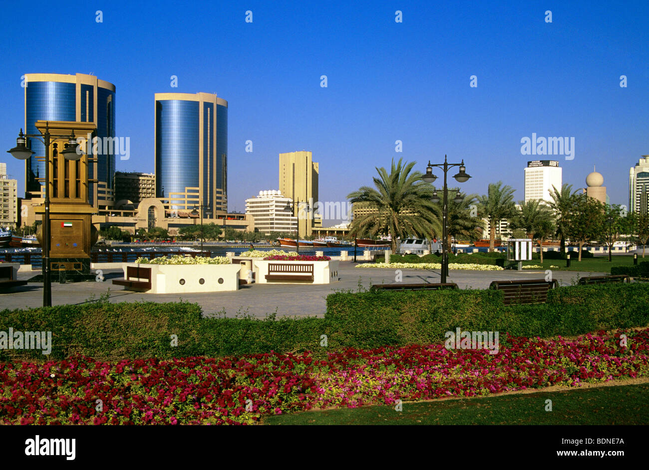 Dubai - The Twin Towers building in Deira viewed from gardens on the ...