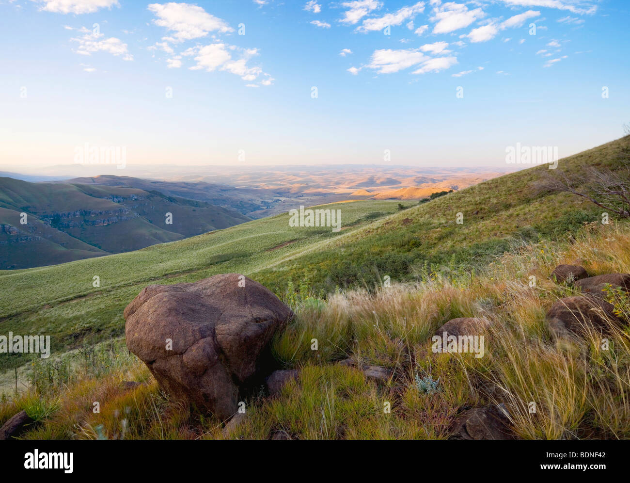 Mountain grass on ridge in Elliot Mountains, with farmland in valley ...