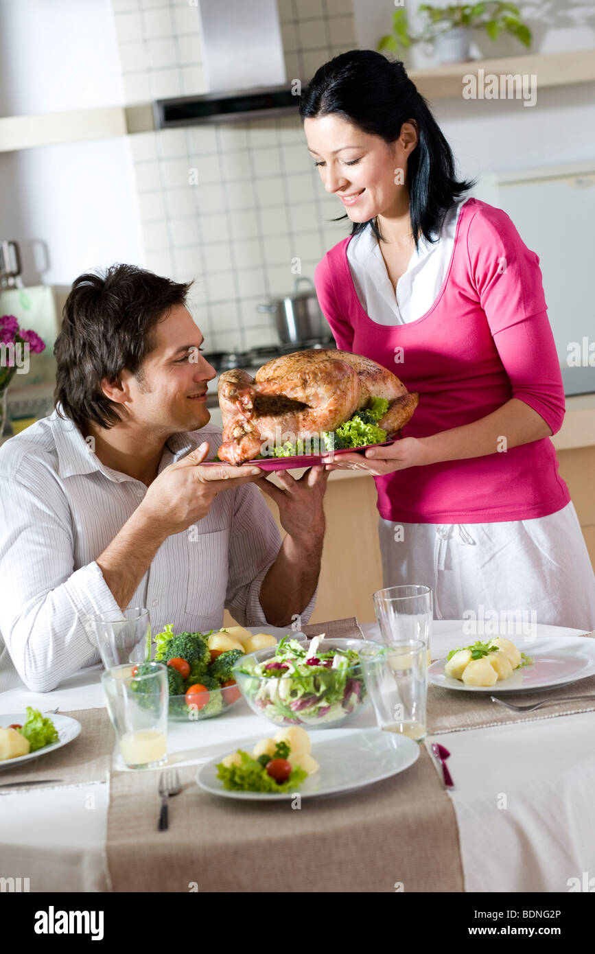 Couple eating dinner Stock Photo - Alamy