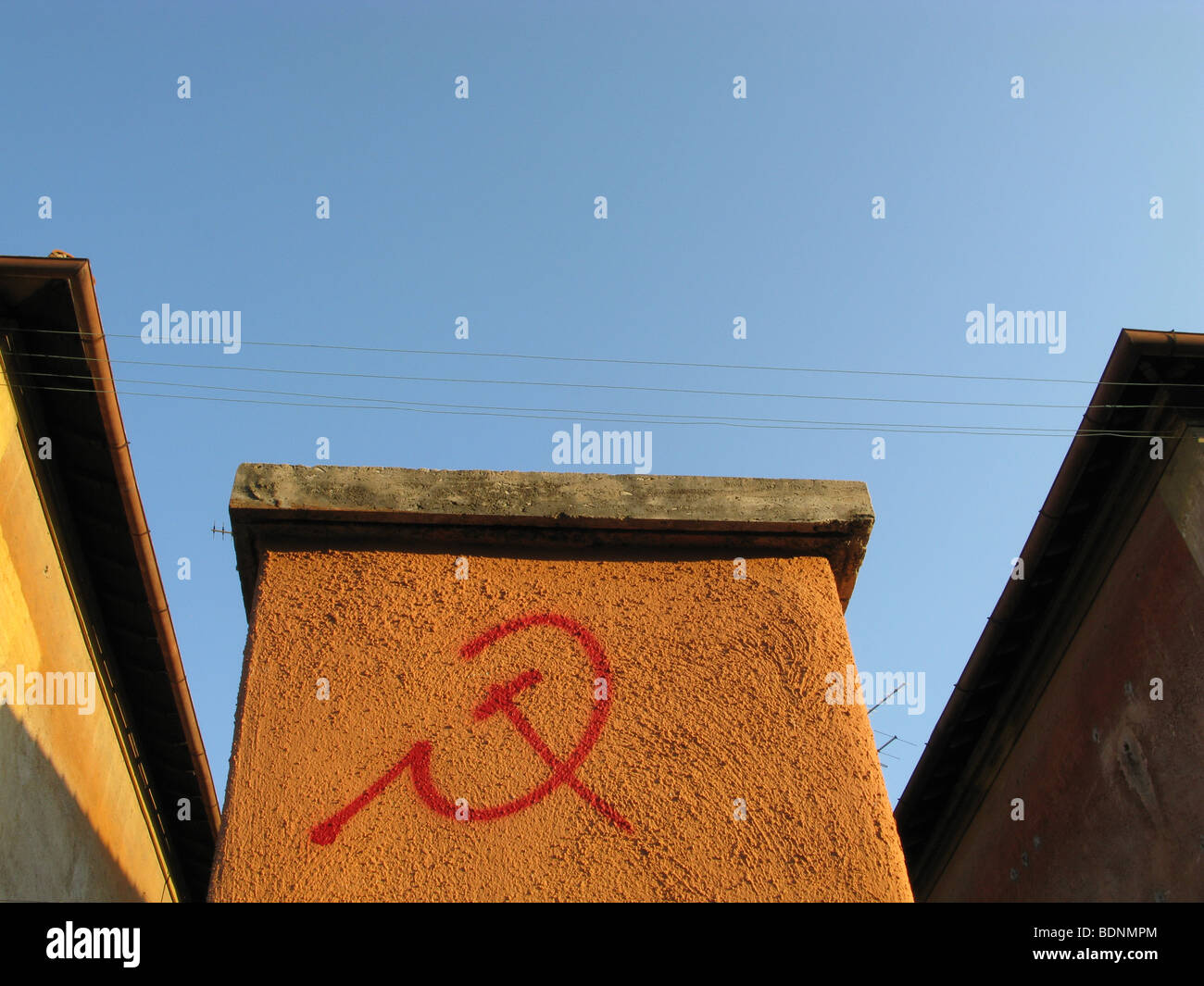 communist symbol written on wall in garbatella, rome Stock Photo - Alamy