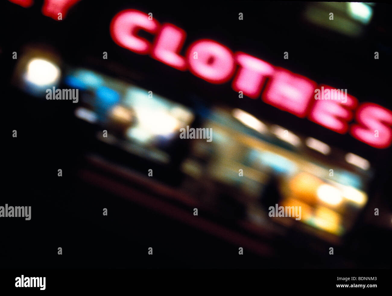 Colorful clothes store neon sign Stock Photo - Alamy