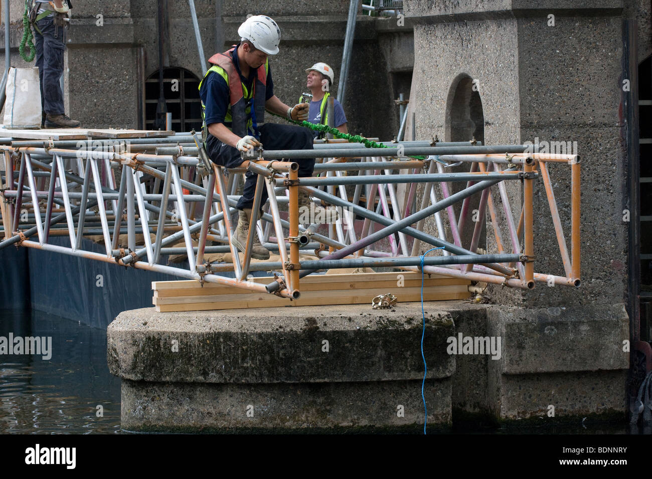 building scaffold scaffolding site construction rig workers Stock Photo ...