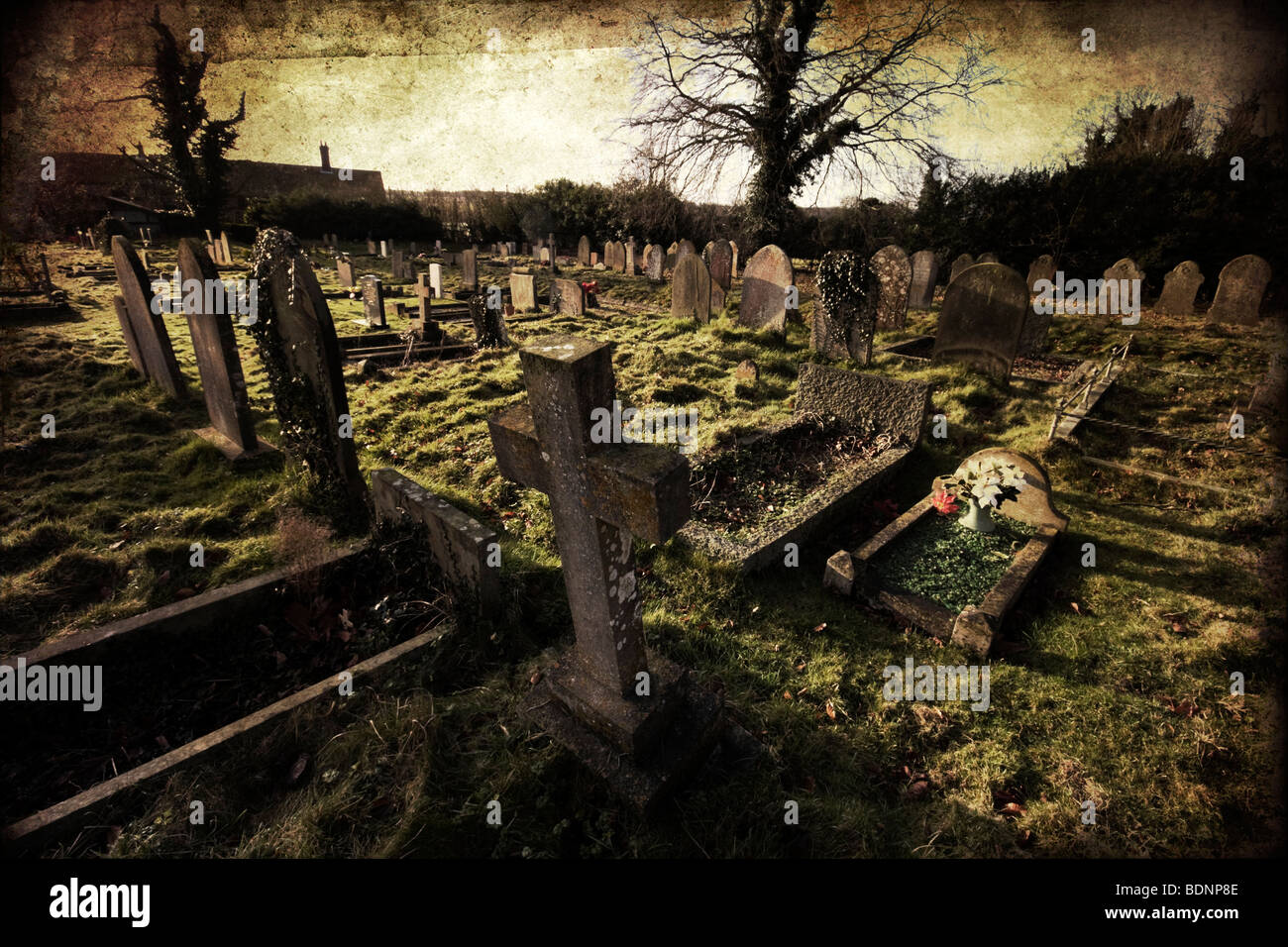 A church graveyard in the village of Castle Acre in Norfolk, England ...