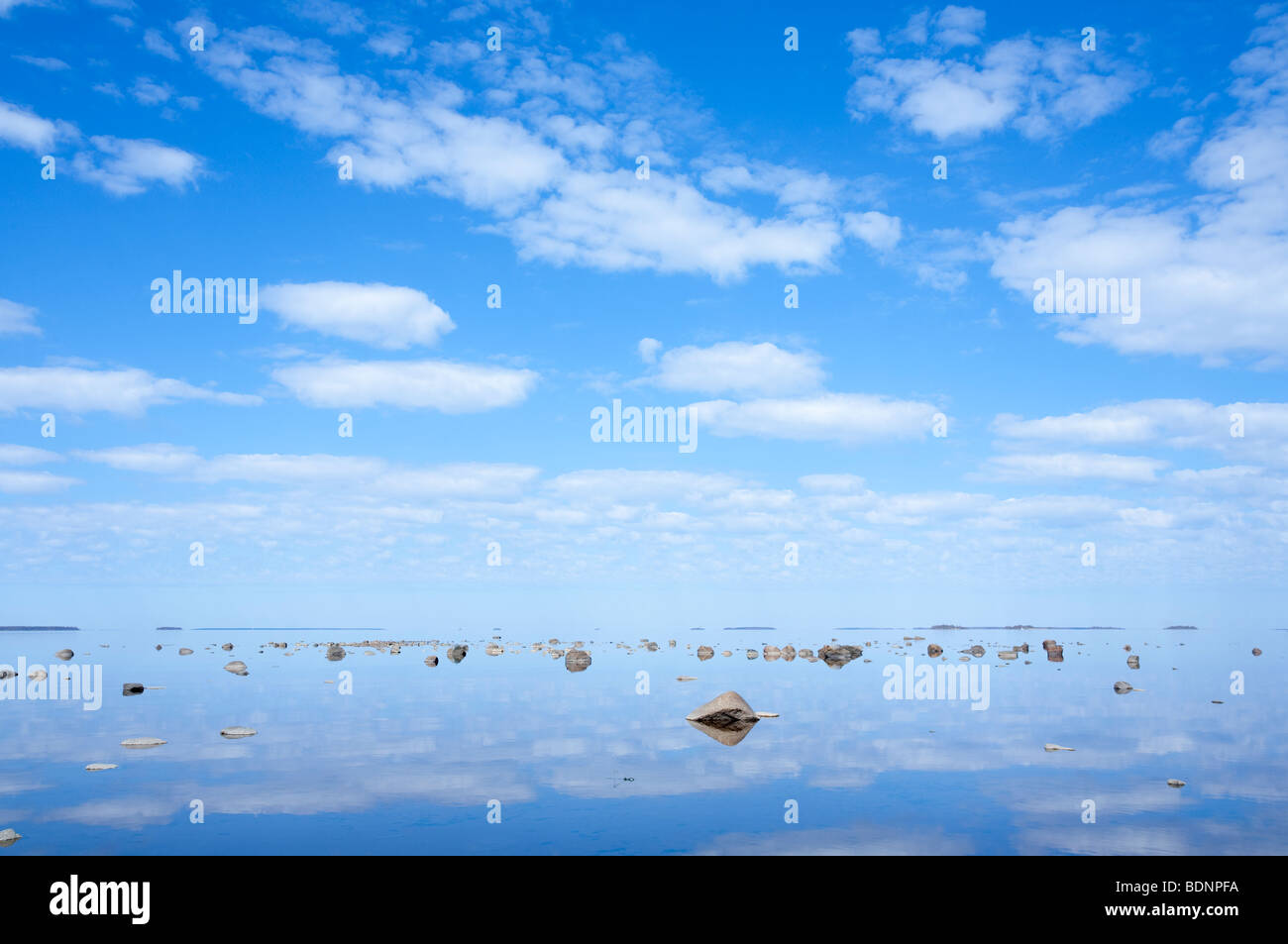 Shallow sea water revealing rocky hi-res stock photography and images ...