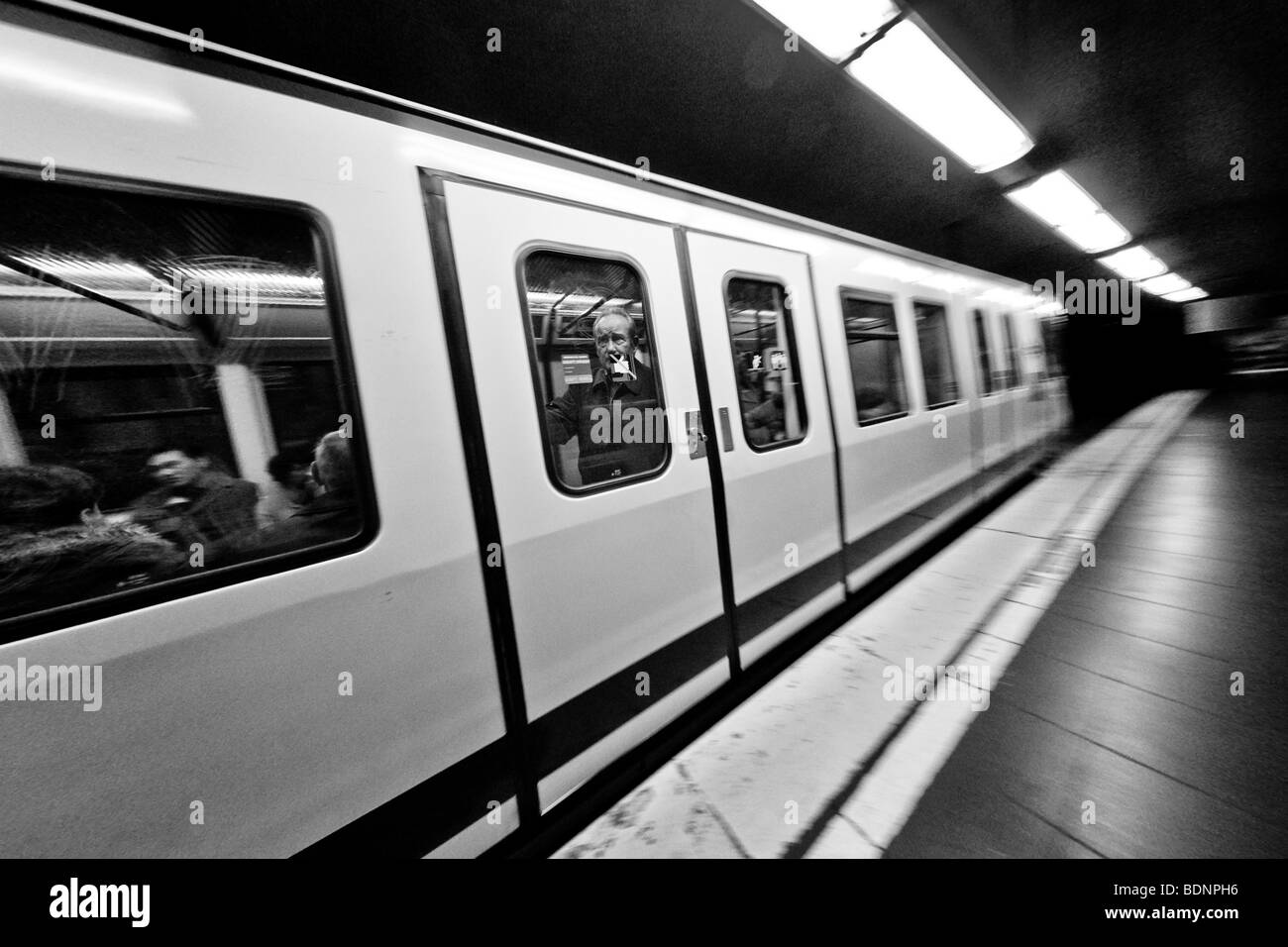 Black and white of a commuter on a train hi-res stock photography and ...